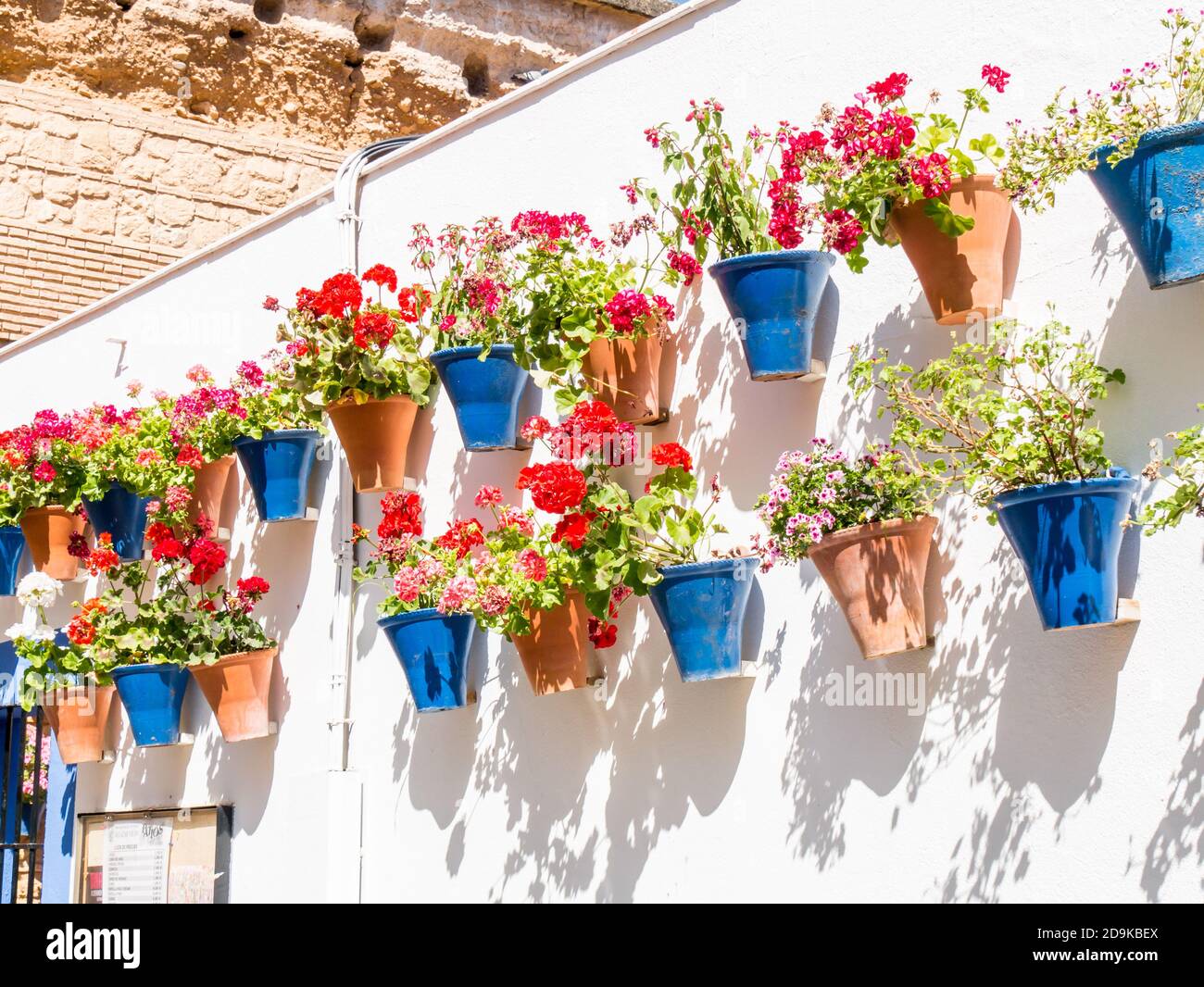 Hanging flower buckets hi-res stock photography and images - Alamy