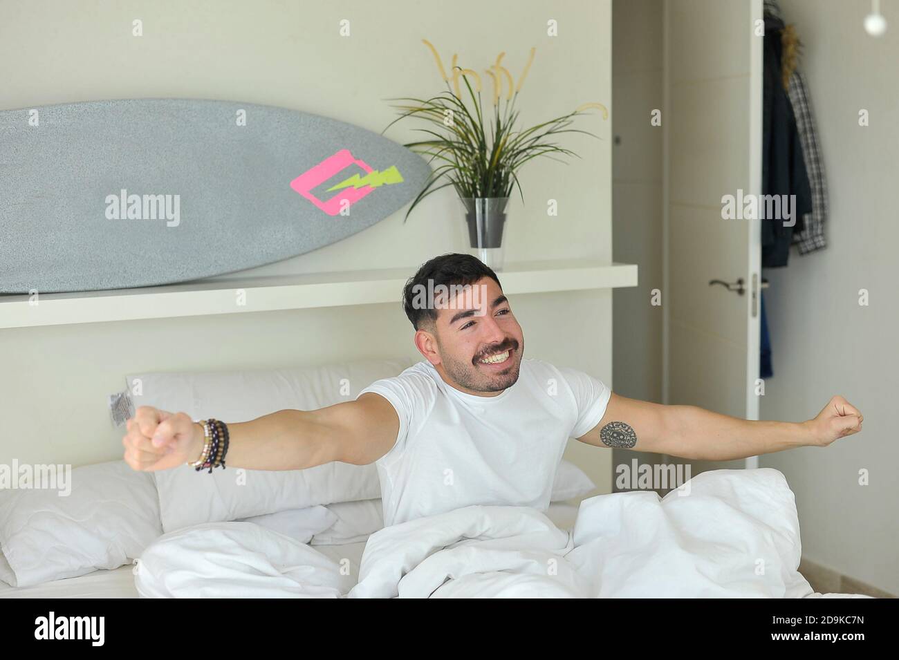 Man waking up in the morning. Positive concept Stock Photo - Alamy