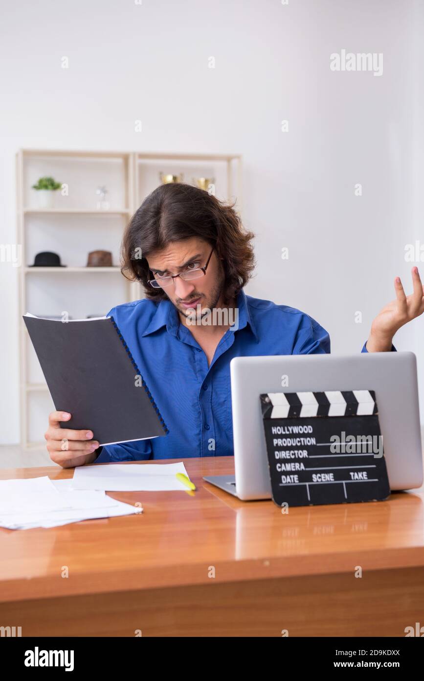 Movie director reading script hi-res stock photography and images - Alamy
