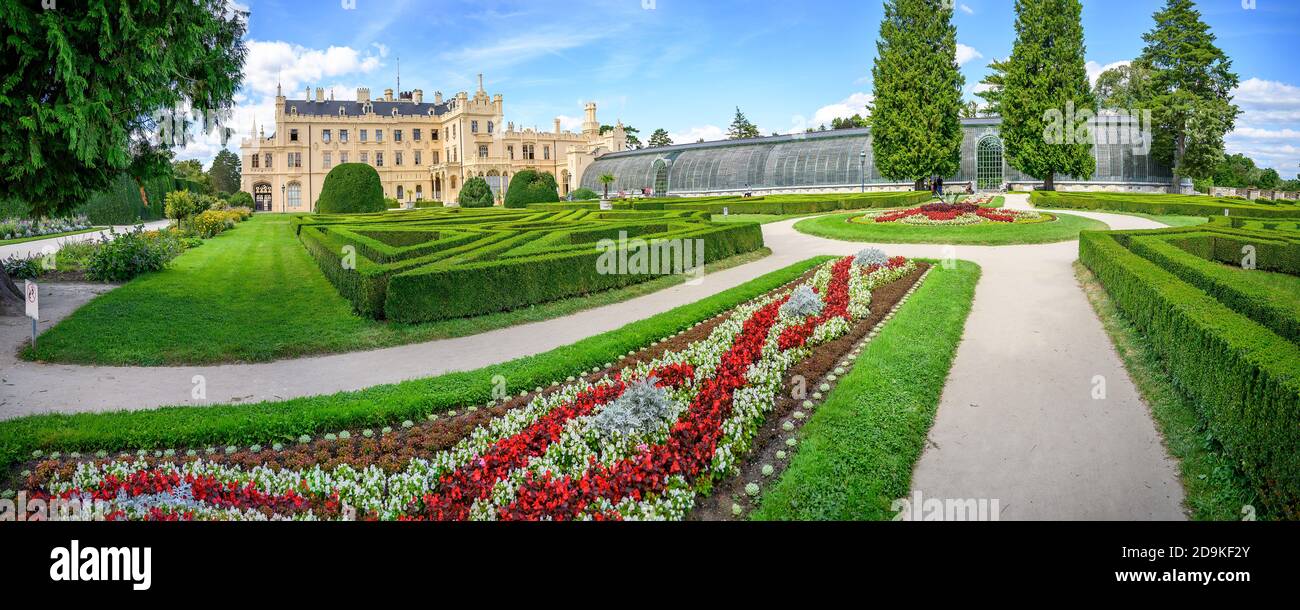 Panoramic view of flower garden with conservatory of Lednice chateau ...