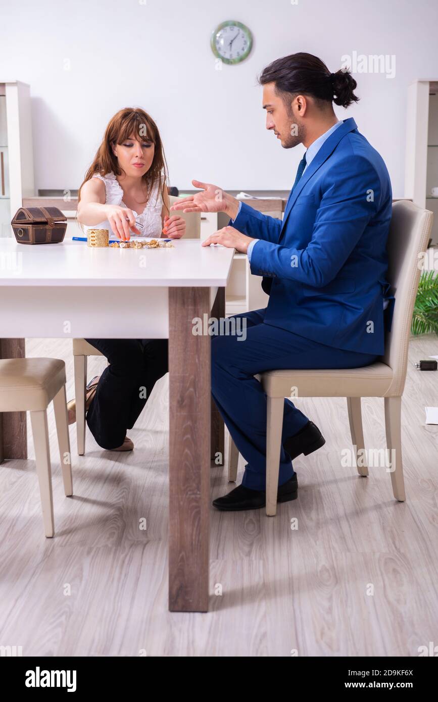 Female owner and police officer in housebreaking concept Stock Photo ...