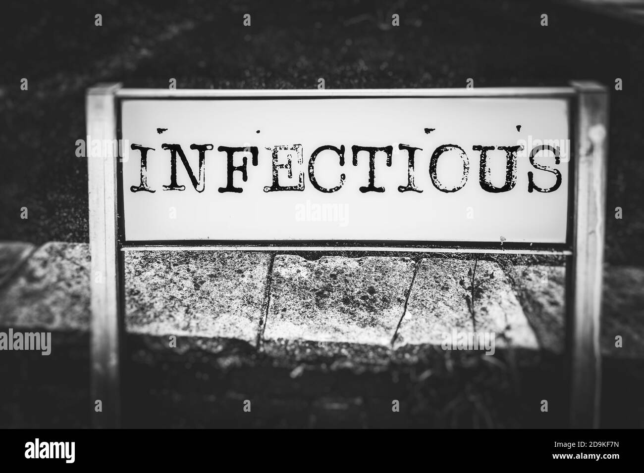 Infectious on a road sign Stock Photo - Alamy