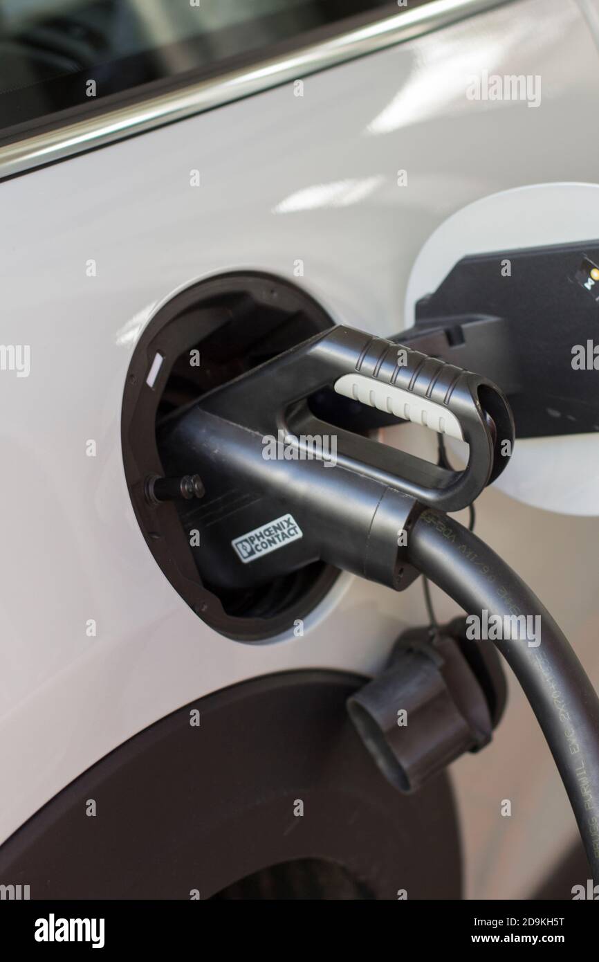 At the charging station with the electric Mini Cooper SE Stock Photo ...