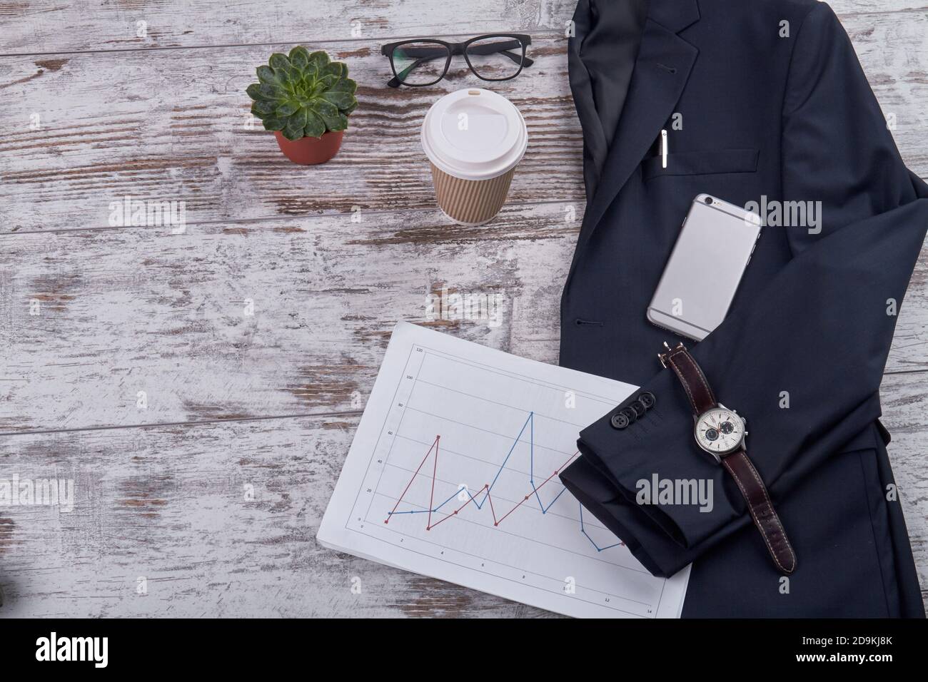 Flat lay businessmen jacket and handwatch Stock Photo - Alamy
