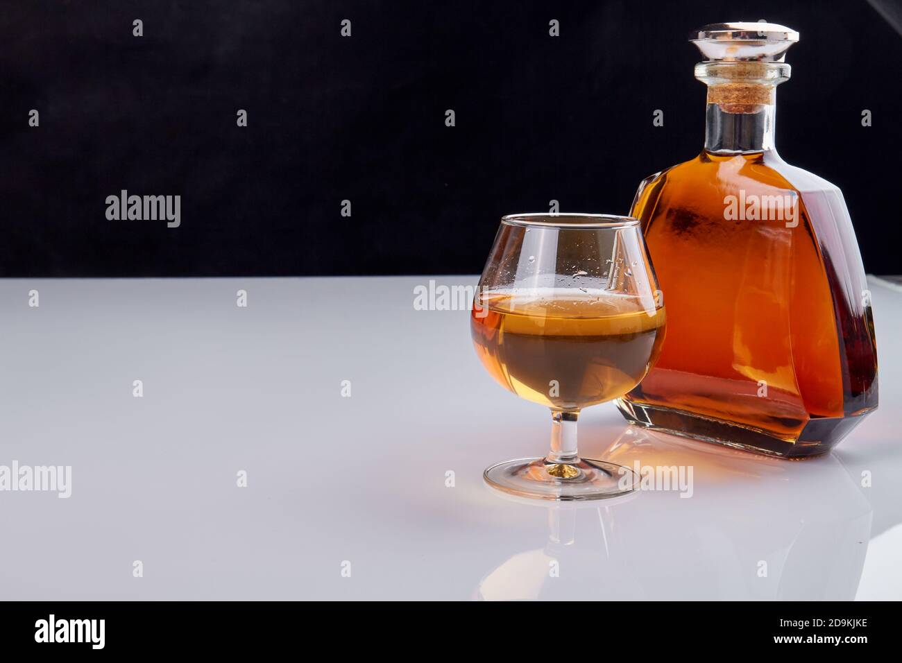 Bottle and glass of whiskey Stock Photo - Alamy