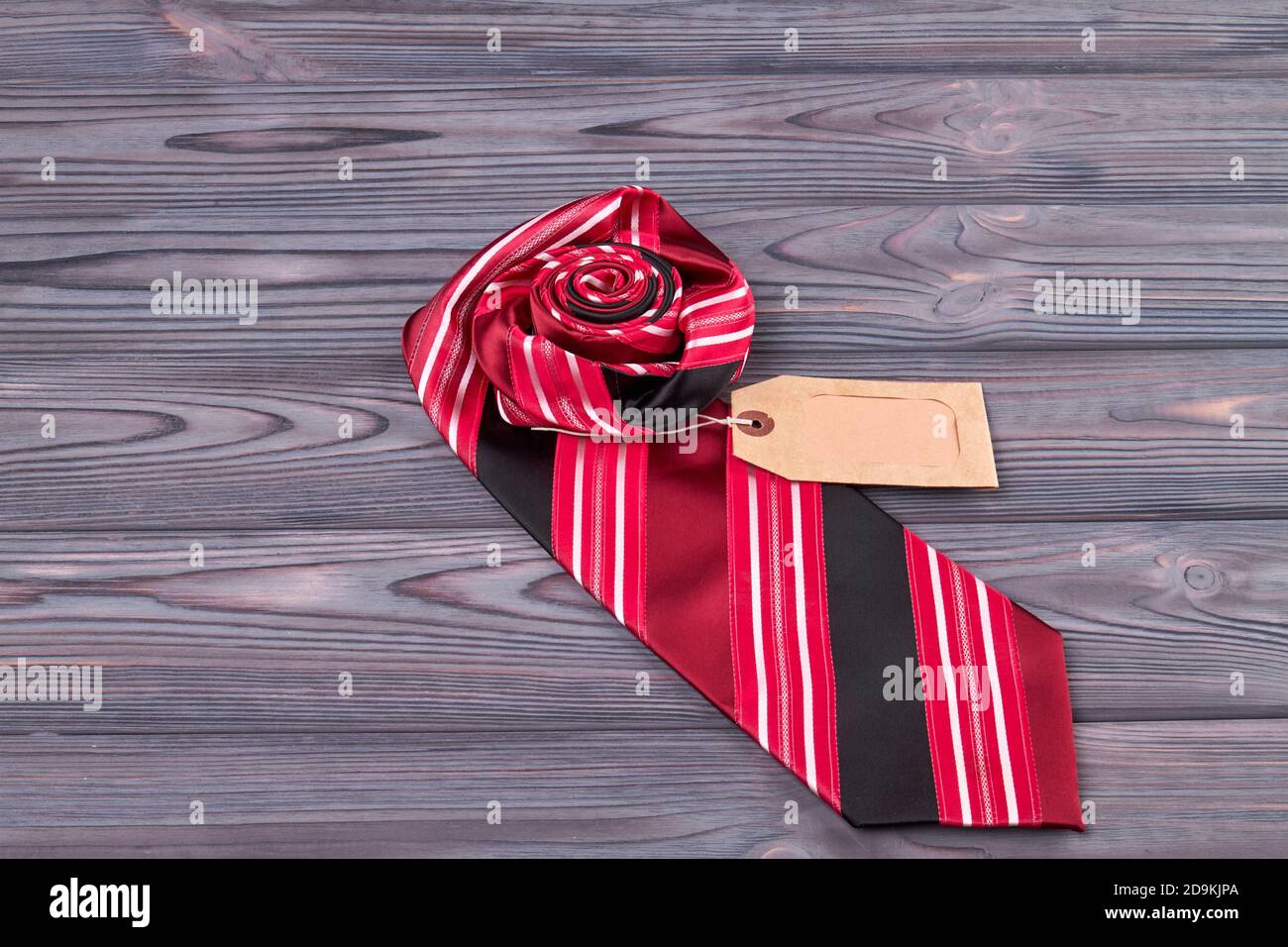Red tie and tag Stock Photo - Alamy