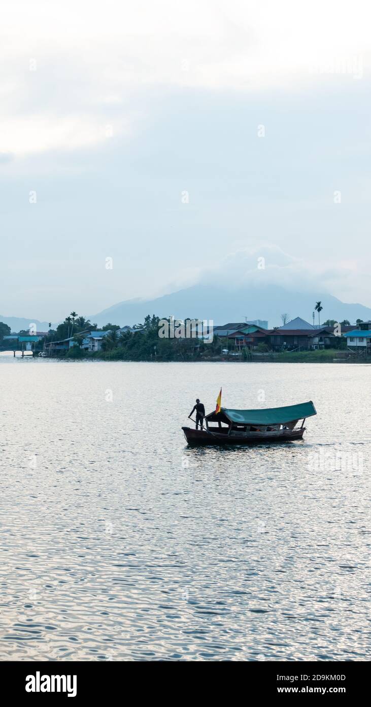 Sarawak River Cruise boat cruising along Sarawak River in Kuching ...