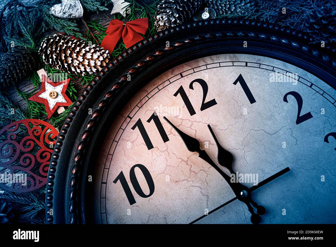 New Year's clock shows five to midnight and decorations Stock Photo - Alamy