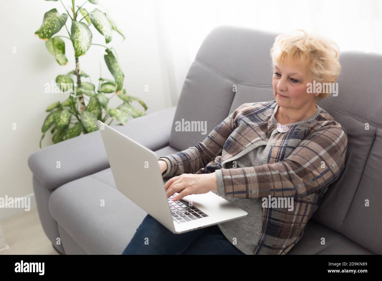 The elderly woman at the computer Stock Photo - Alamy