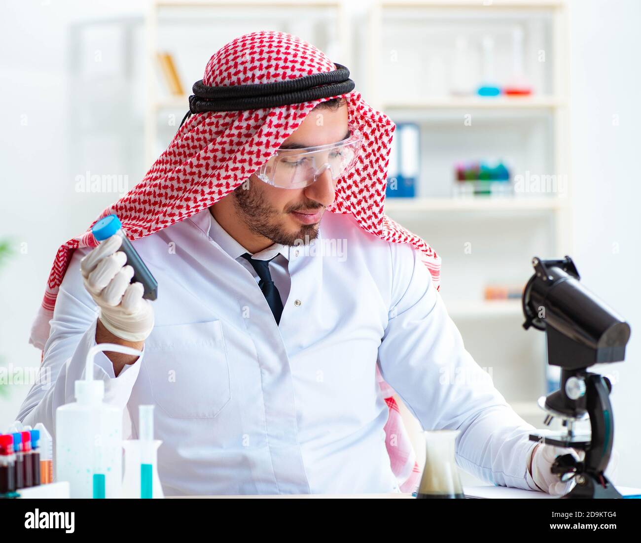 The arab chemist scientist testing quality of oil petrol Stock Photo ...