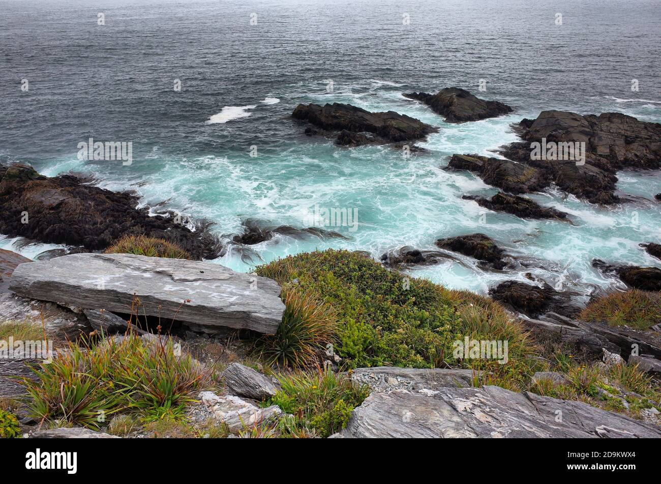 Rocky coast view with waves crash rocks view from above from cape with ...