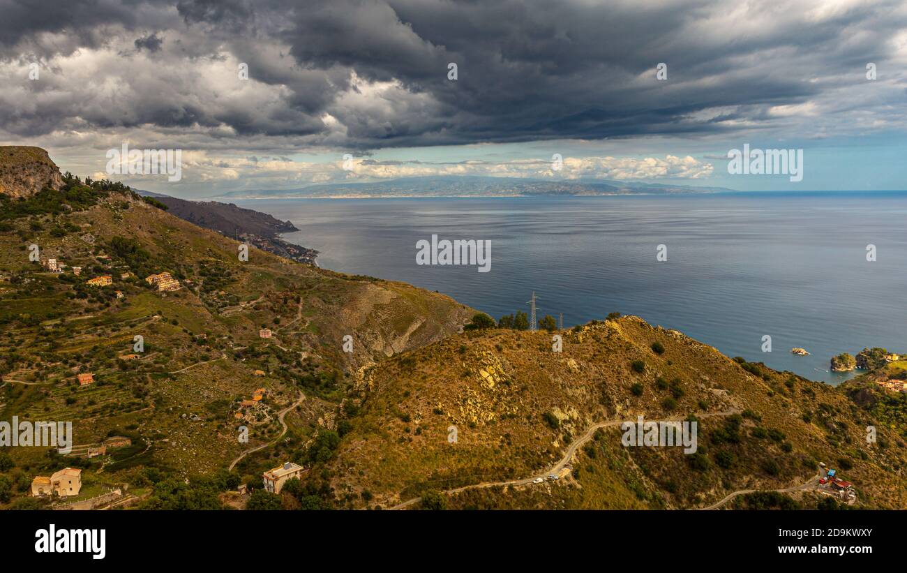 between sky and sea black clouds.Landscape of the Strait of Sicily ...