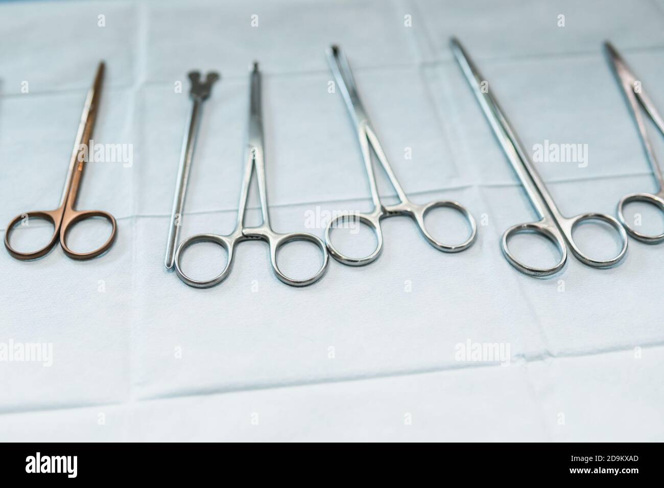 Surgery tools on a white table inside an operation room in a hospital ...