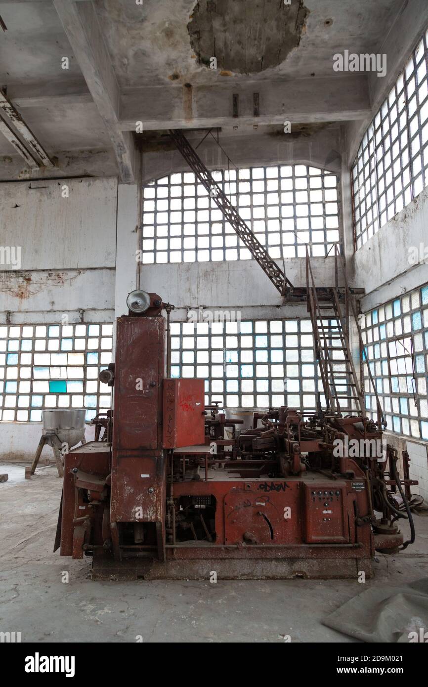 Vertical shot of an industrial plant in an old workshop with square ...