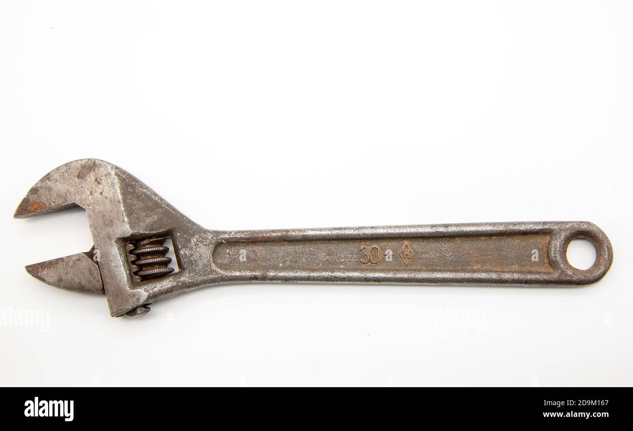 Old rusty Adjustable Wrench on white background Stock Photo - Alamy