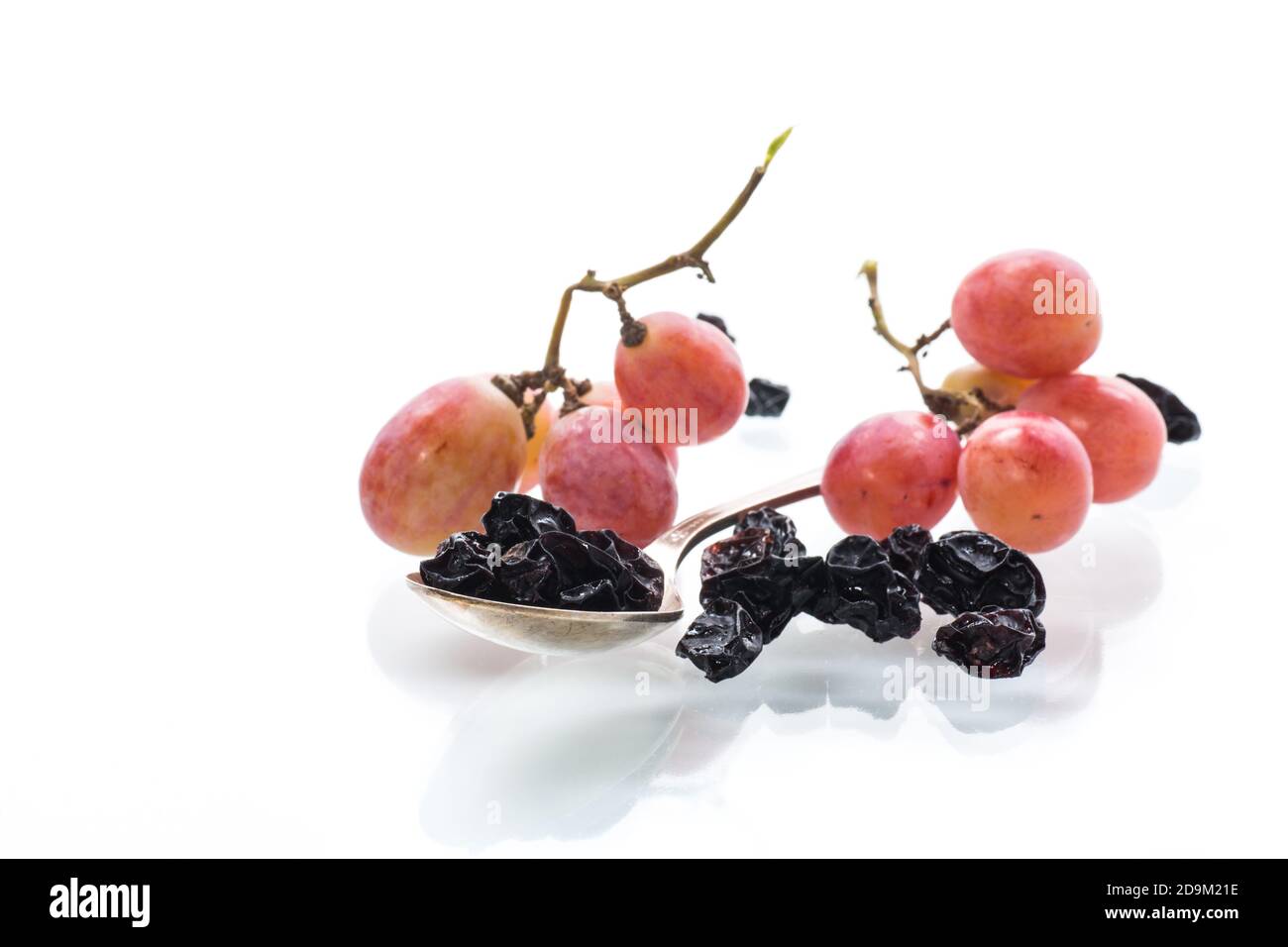 dried natural organic raisins and fresh grapes Stock Photo - Alamy