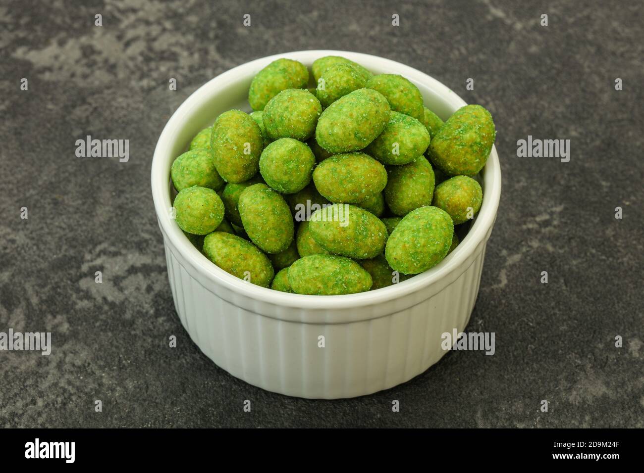 Spicy wasabi peanuts snack in the bowl Stock Photo - Alamy