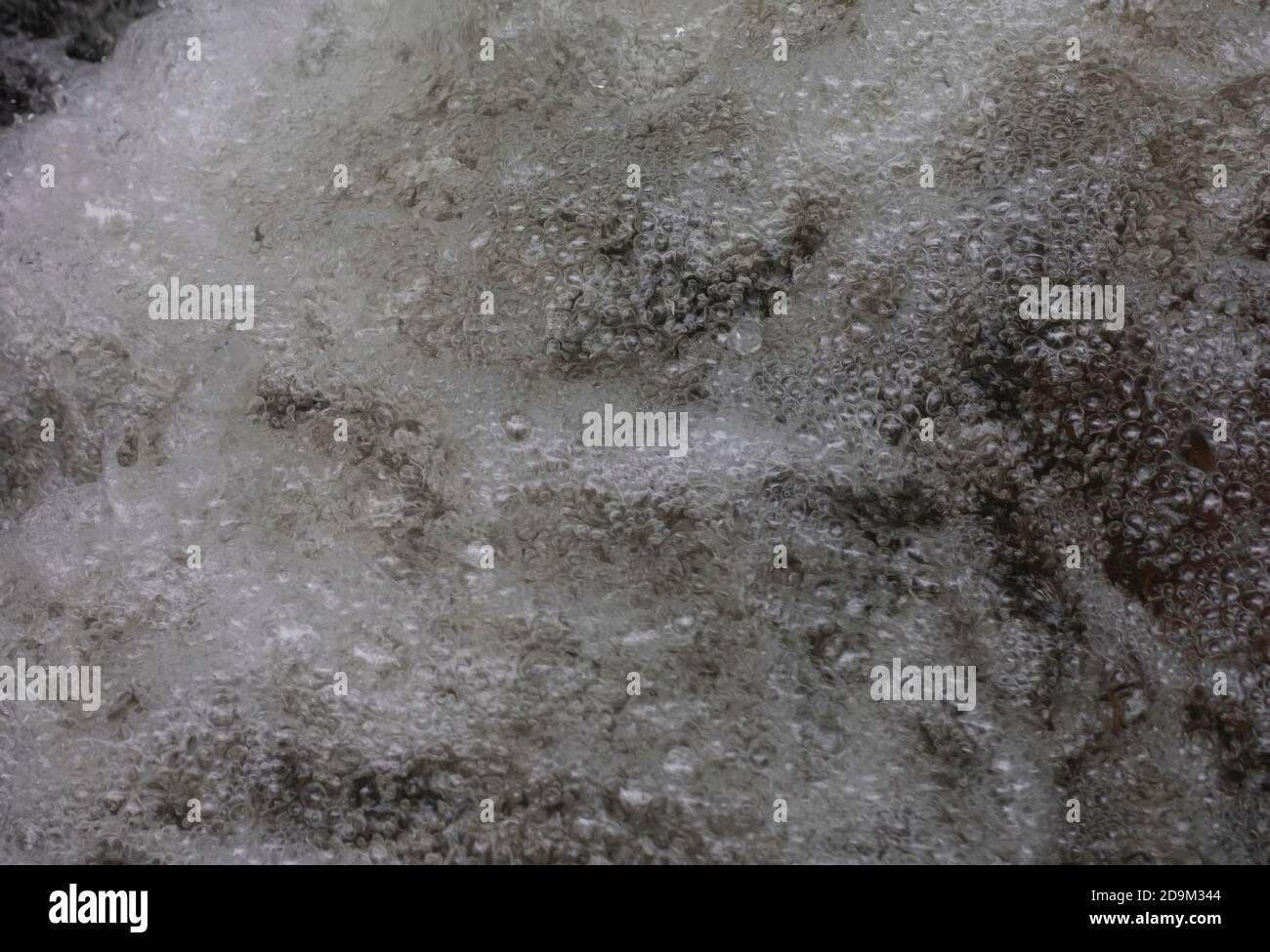 water bubbles in a running stream Stock Photo - Alamy