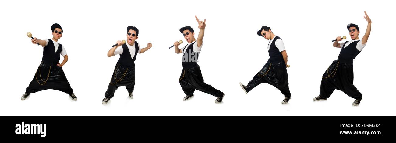 The funny young man dancing isolated on white Stock Photo - Alamy