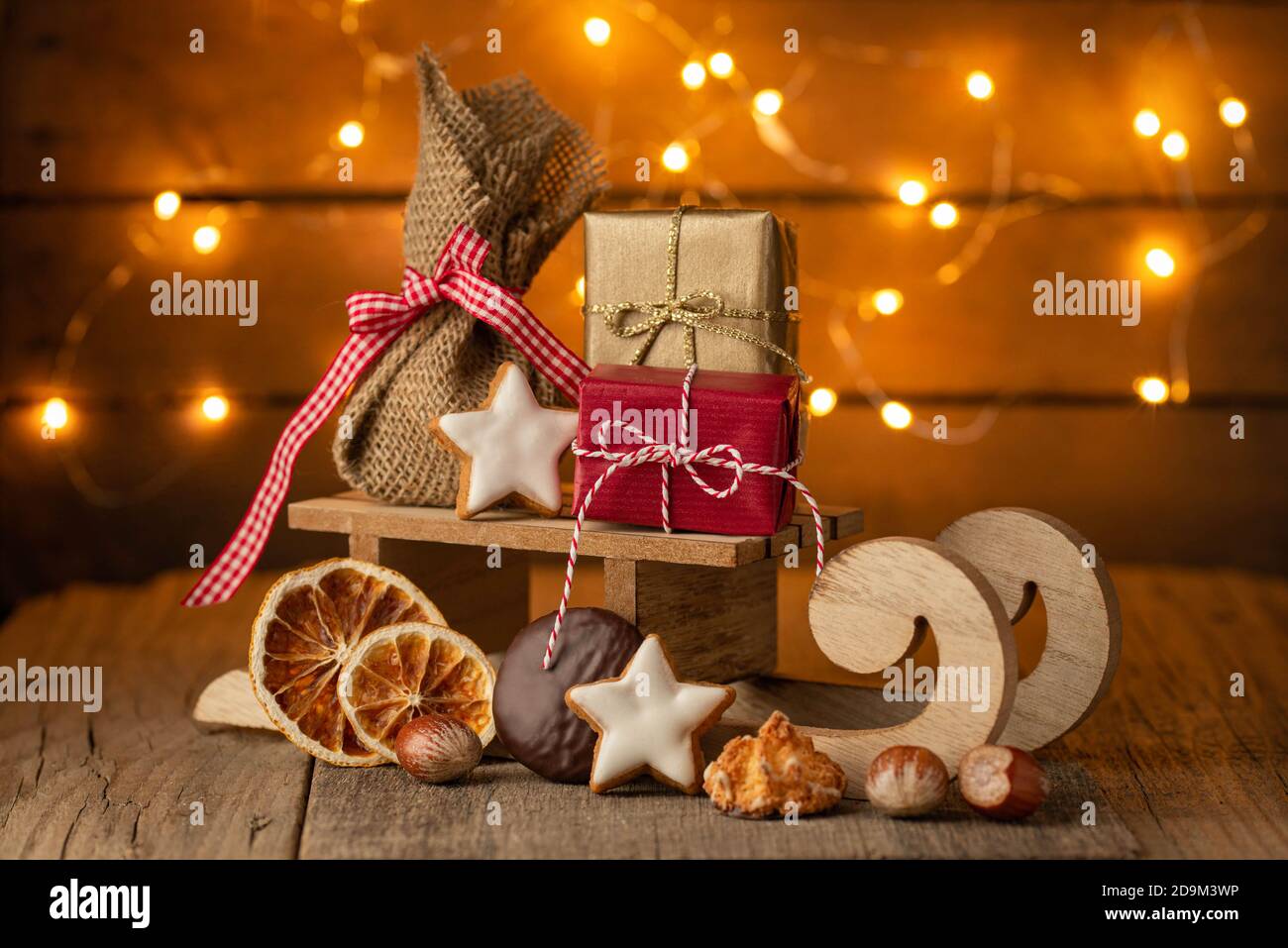 Bright Christmas - small sleigh with Christmas presents and lights on ...