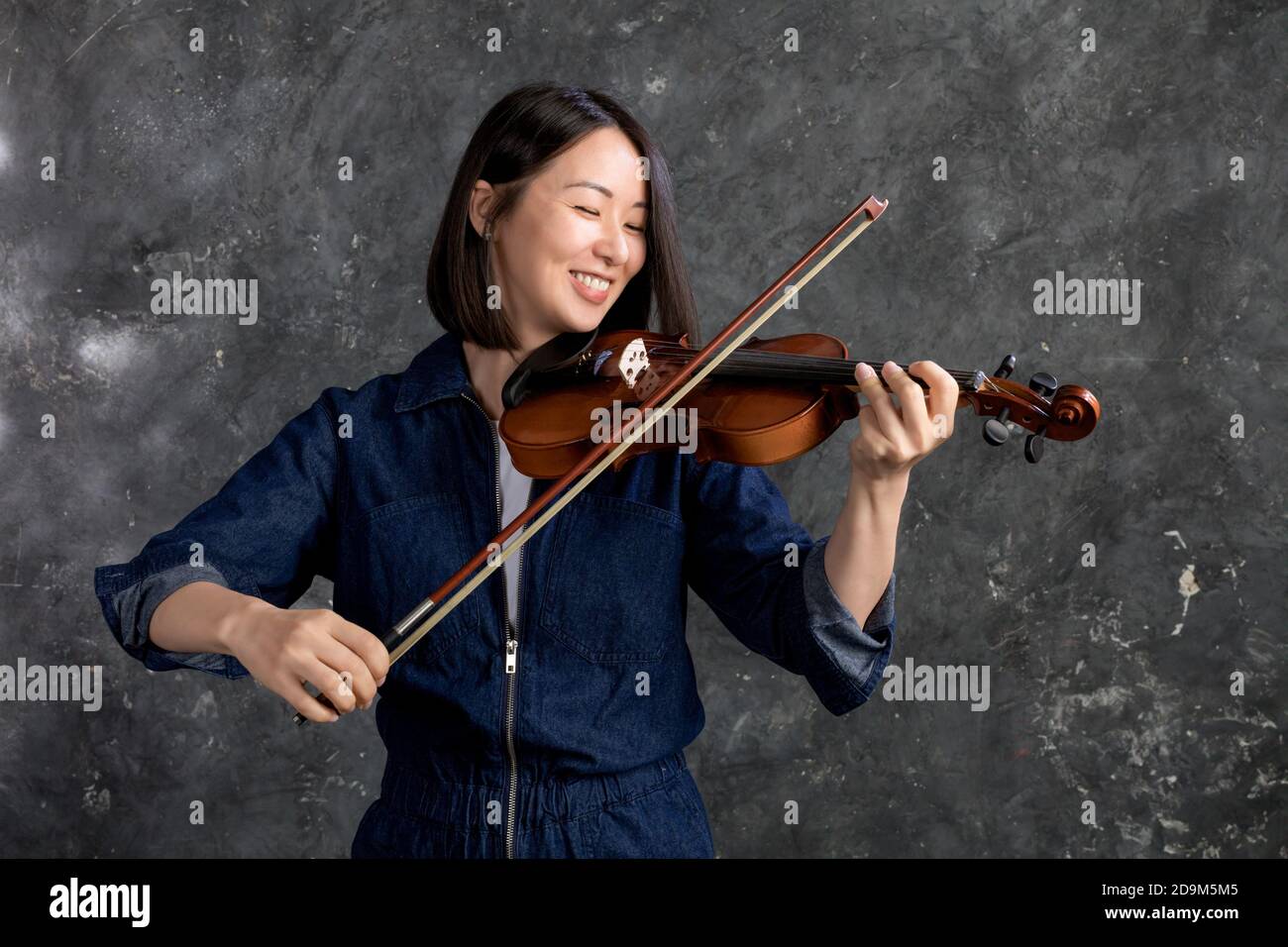 Beautiful korean woman plays violin studio emotional portrait Stock ...