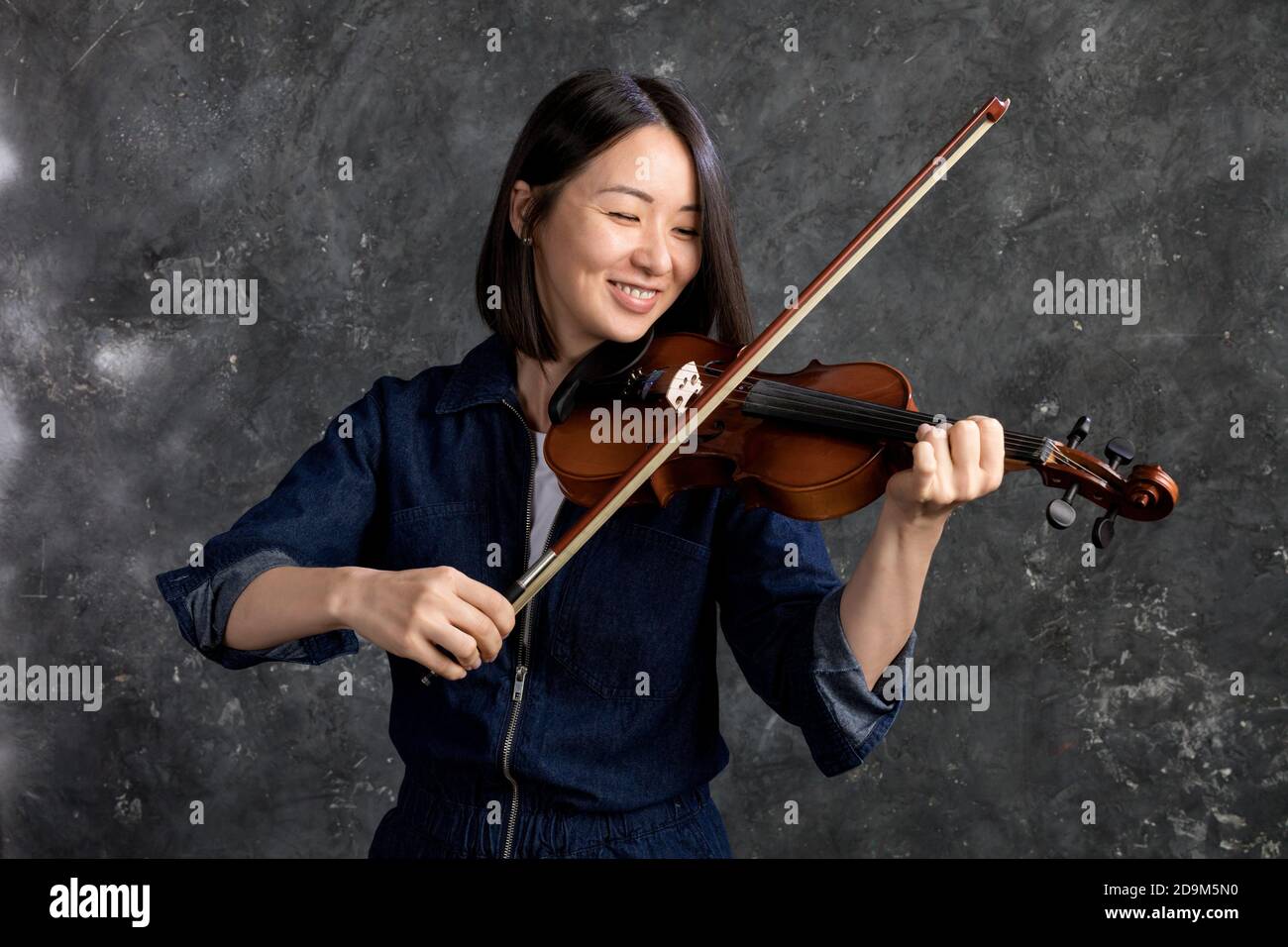 Beautiful korean woman plays violin studio emotional portrait Stock ...