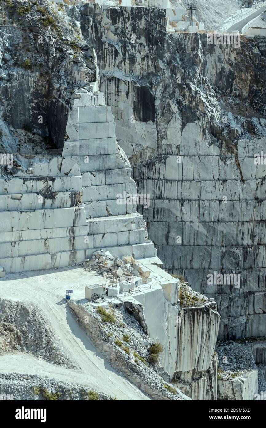landscape with almost vertical quarrying at marble quarry , shot near ...