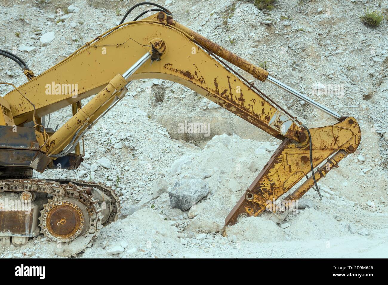 detail of rusty digger leverages at marble quarry , shot near Carrara ...