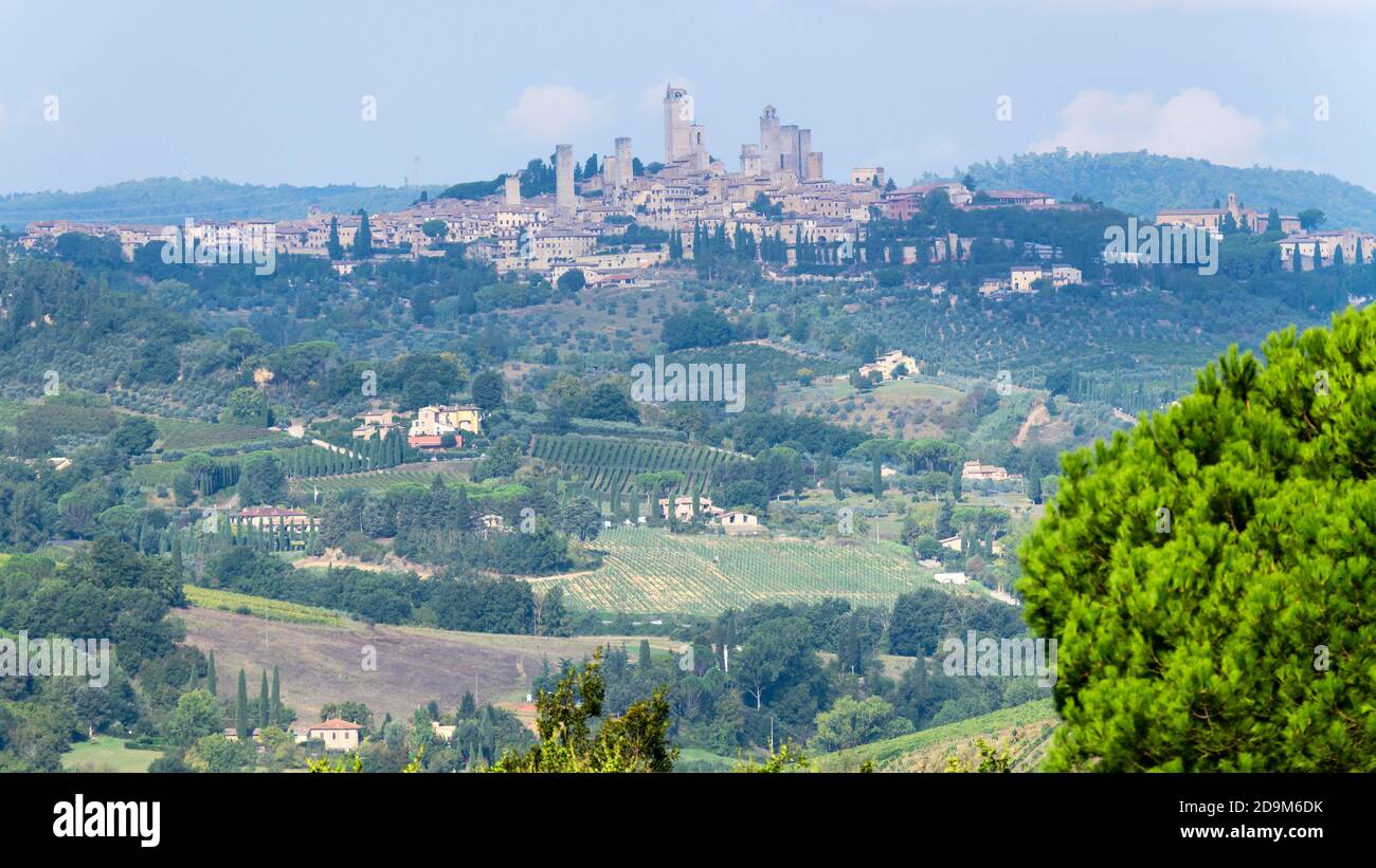 cityscape from east of historical hilltop village in green valley, shot ...