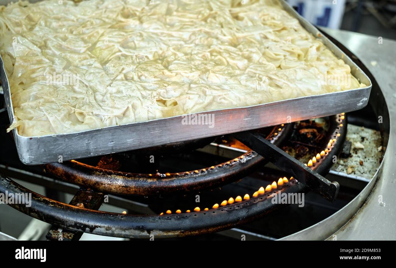 pie in the pan on the fire Stock Photo - Alamy