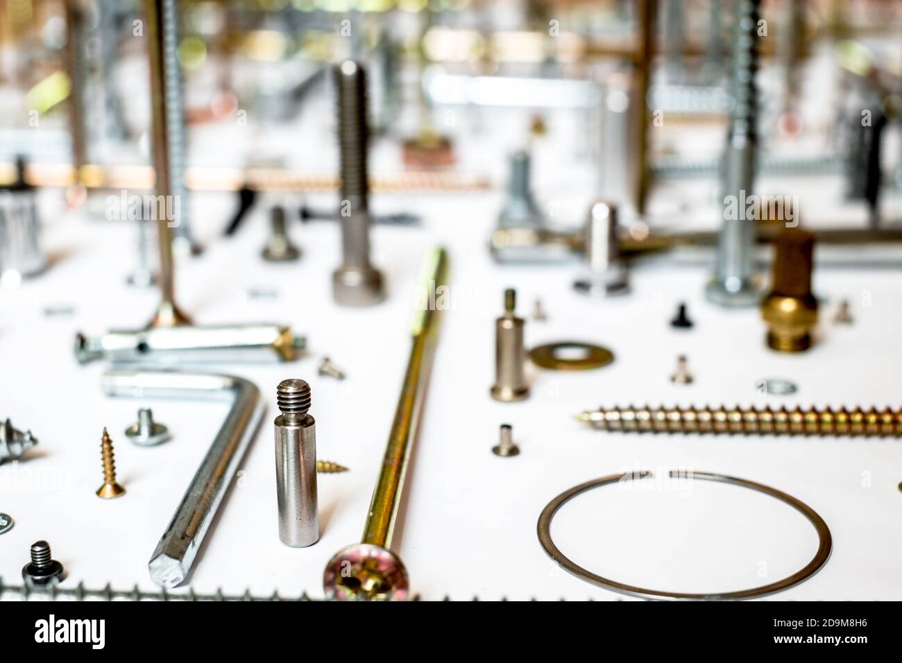 Screws and washers on white background Stock Photo - Alamy