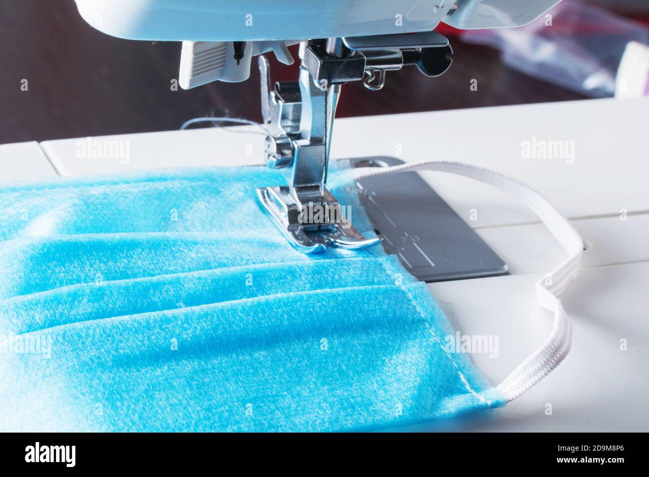 Sewing machine sew home made diy medical reusable protective face mask ...