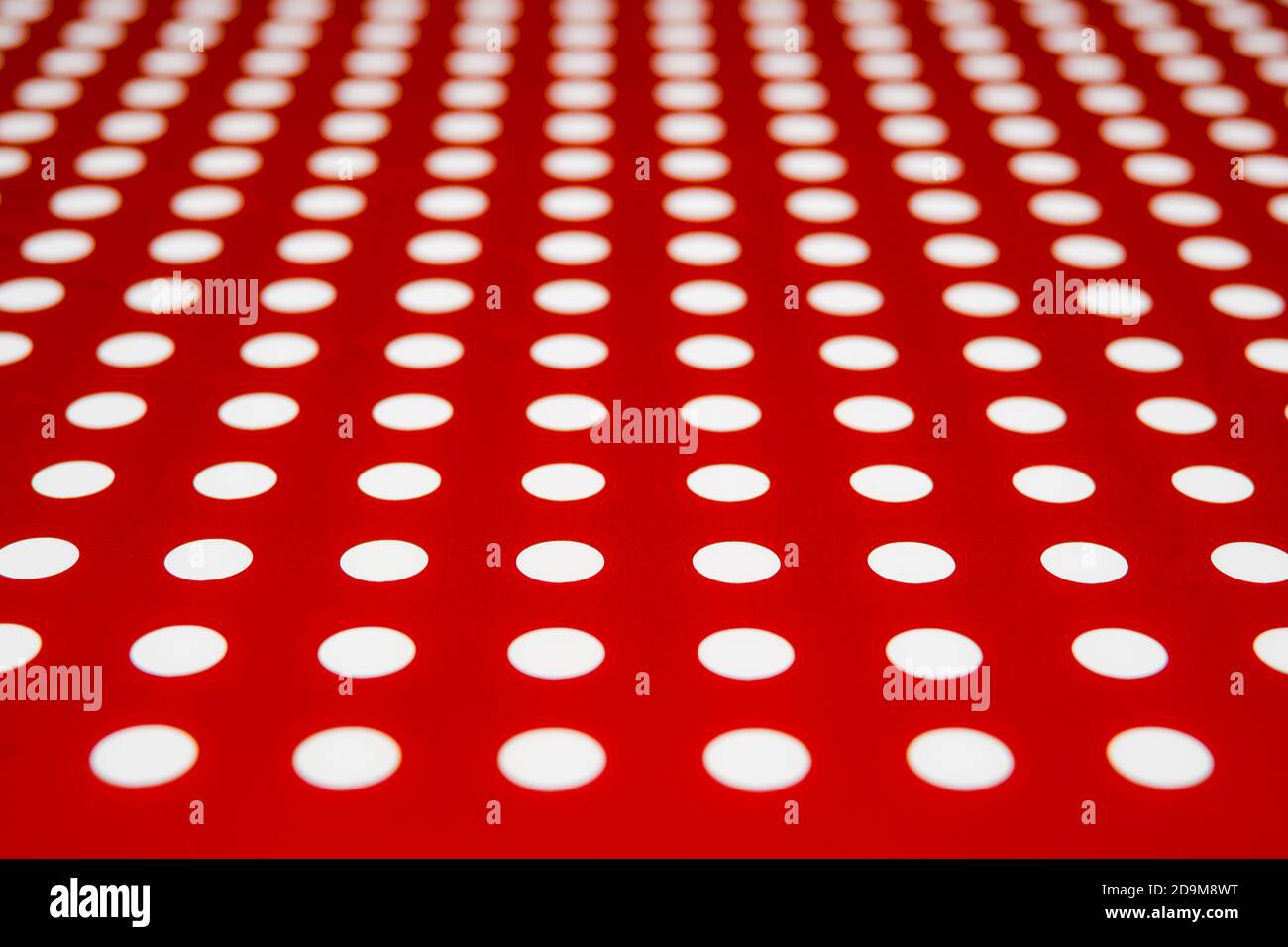 white dots on a red background Stock Photo - Alamy