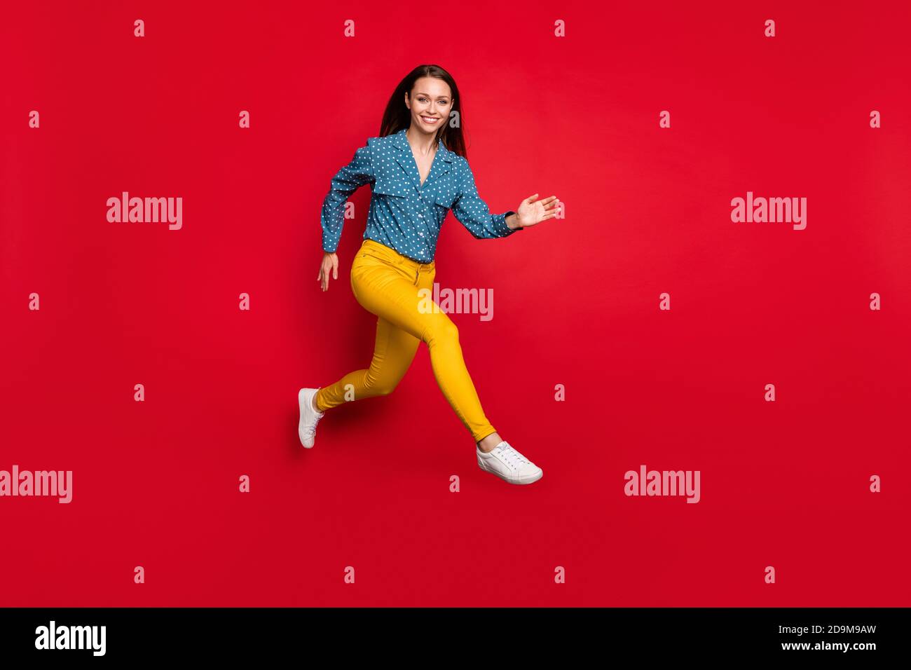Full length body size view of attractive fit cheerful girl jumping ...