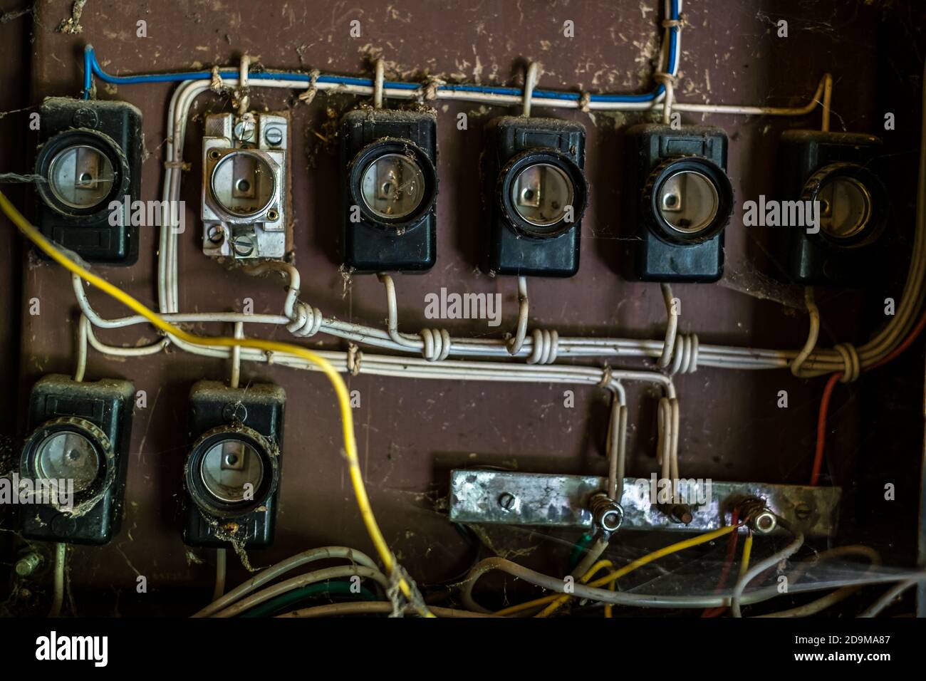 Old ceramic fuse panel in a abandoned building Stock Photo - Alamy