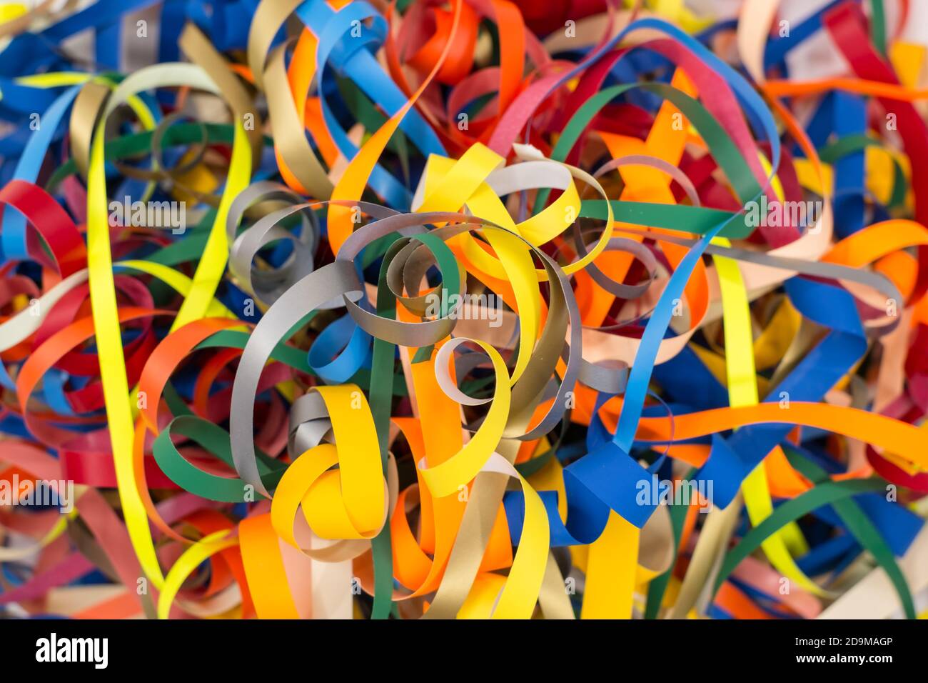 plastic multicolored coiled streamers, close view Stock Photo - Alamy