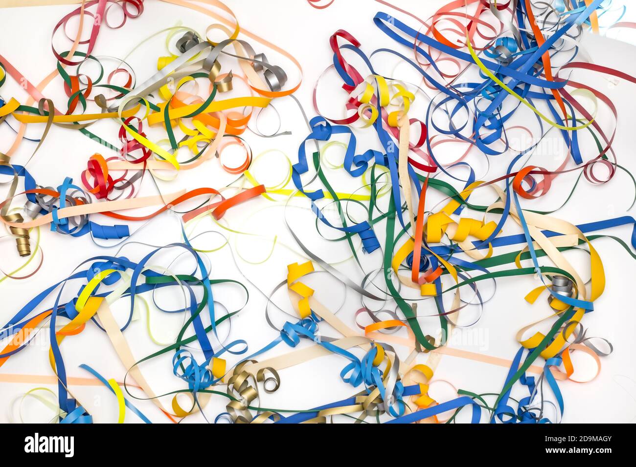 plastic multicolored coiled streamers, close view Stock Photo - Alamy