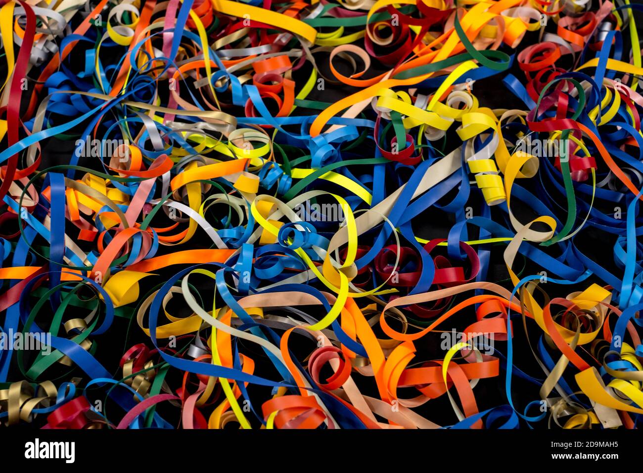plastic multicolored coiled streamers, close view Stock Photo - Alamy