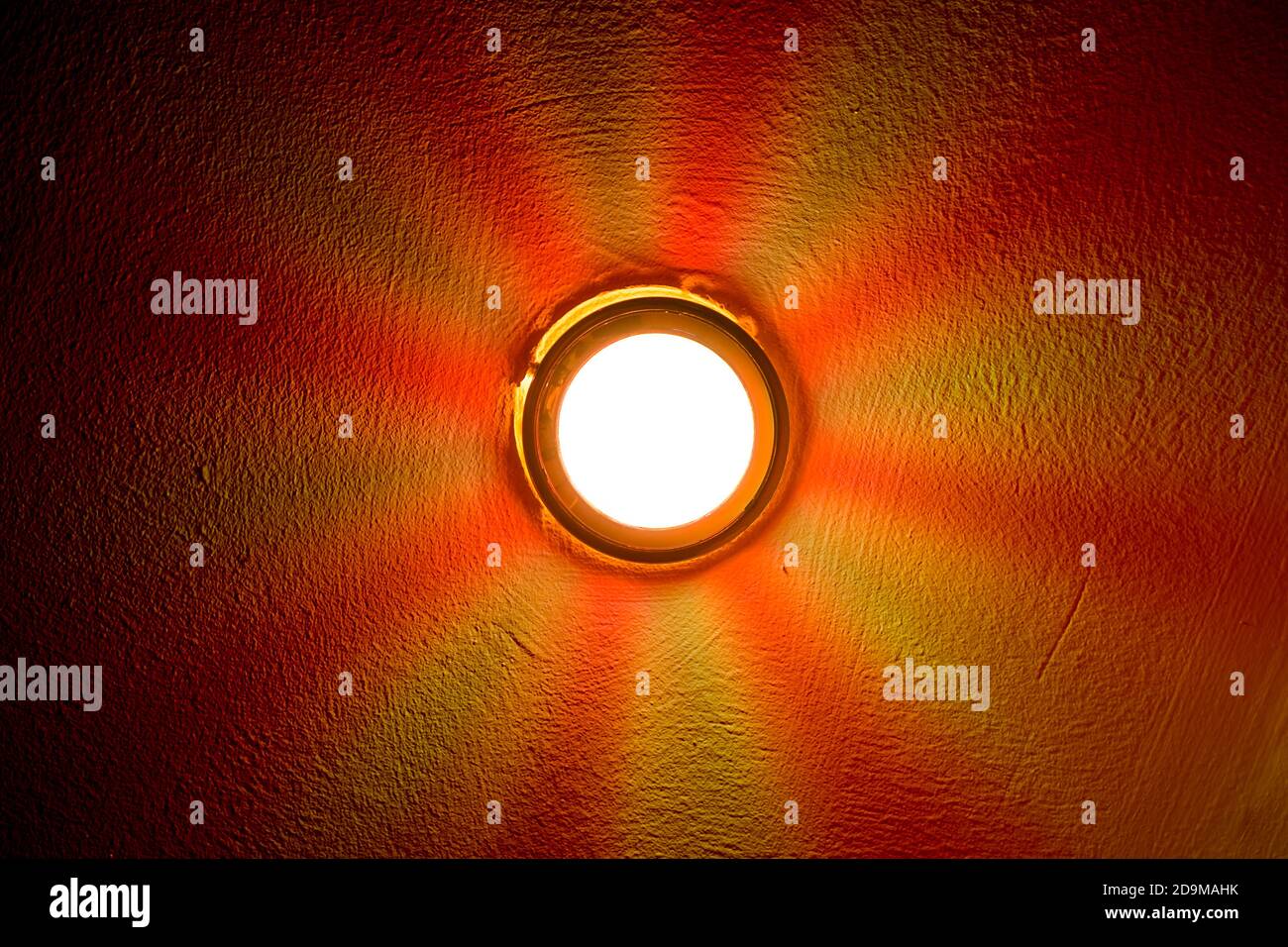 rays of light from the bulb on the ceiling Stock Photo - Alamy