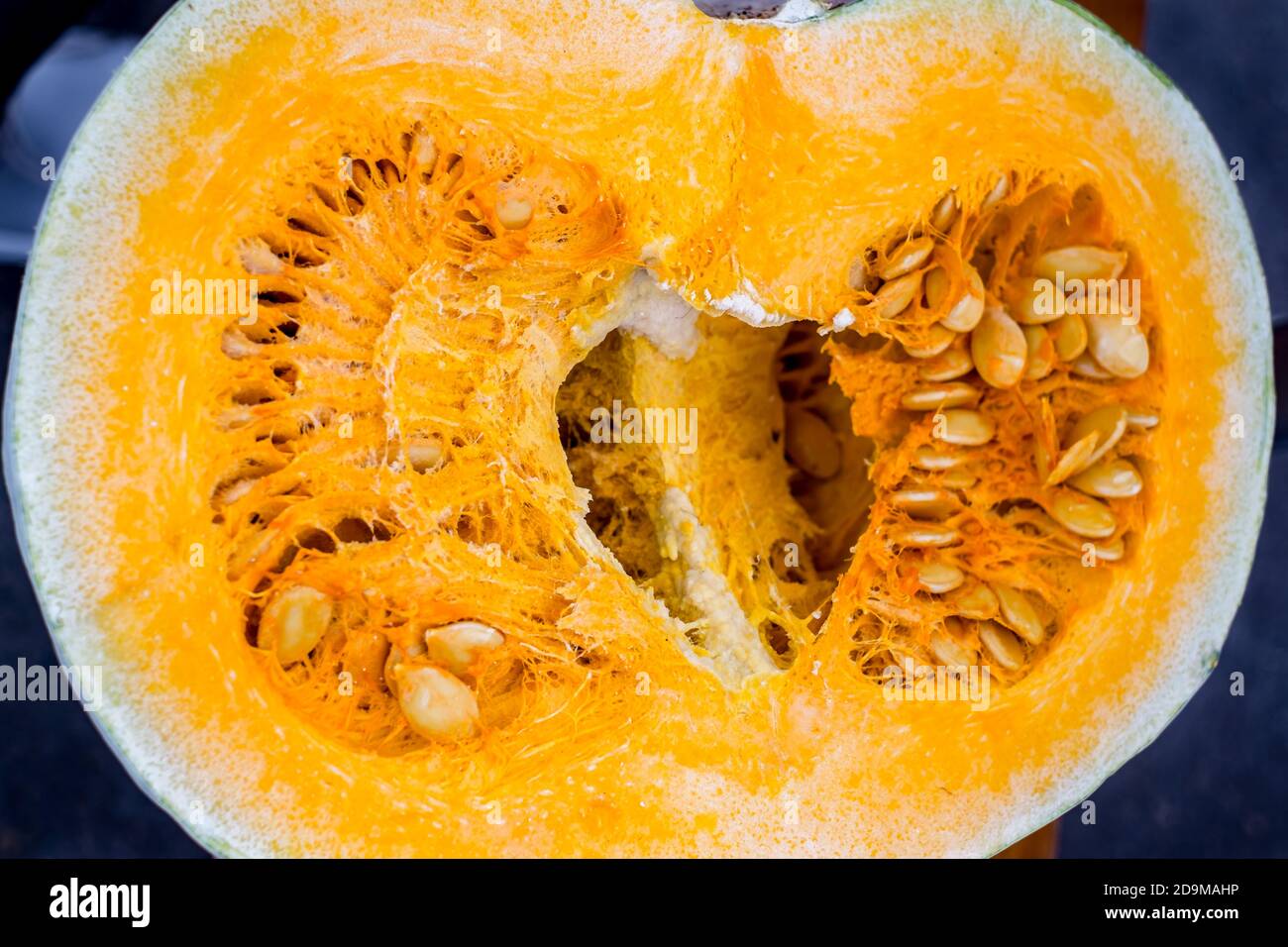 pumpkin cut in half with seeds Stock Photo - Alamy