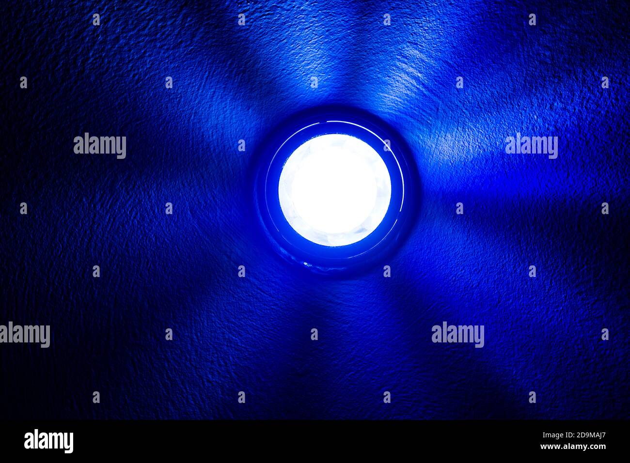 rays of light from the bulb on the ceiling Stock Photo - Alamy