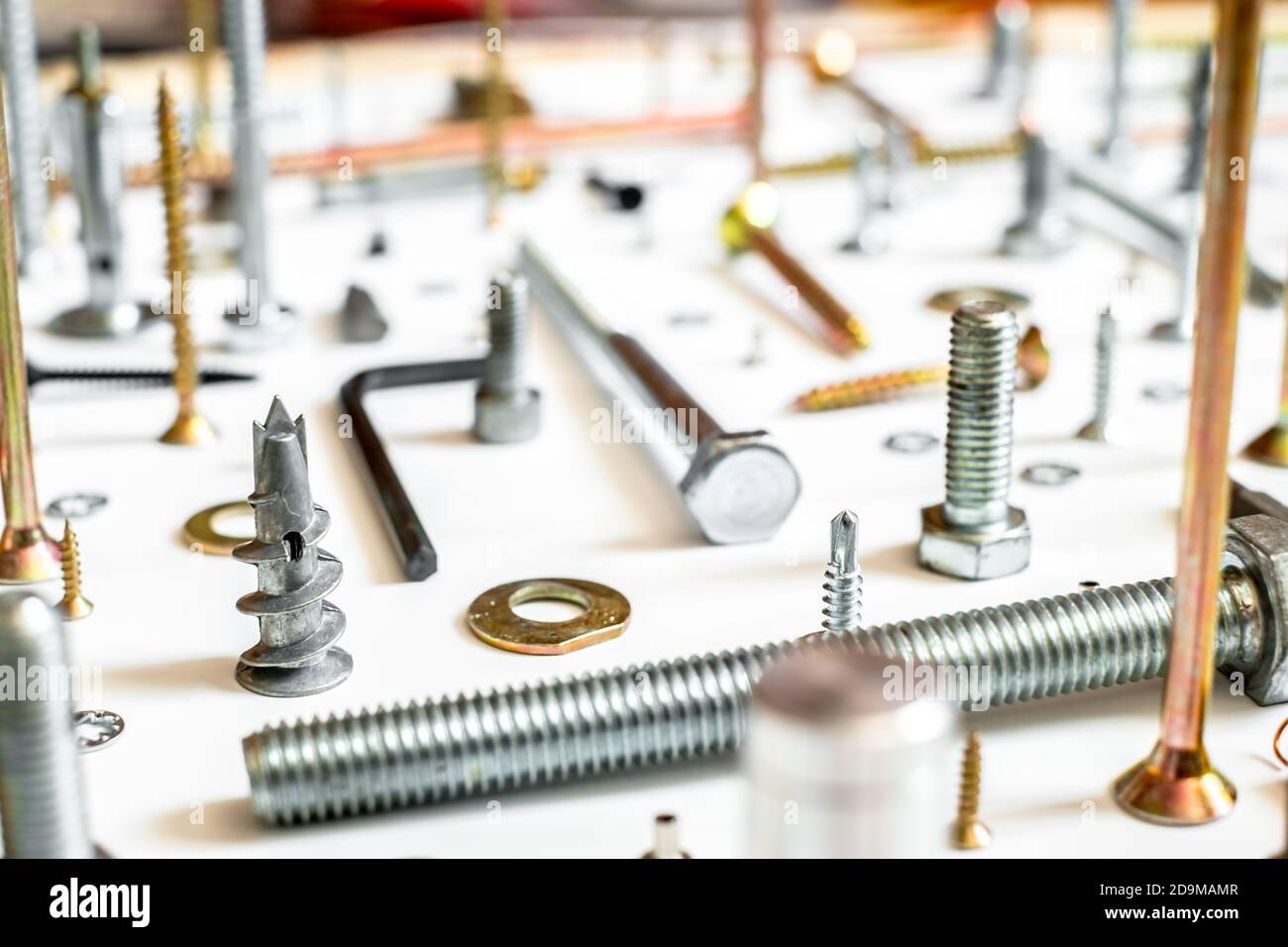 Screws and washers on white background Stock Photo - Alamy