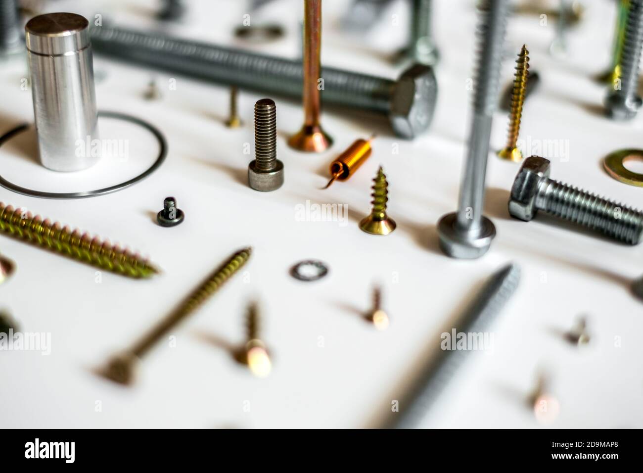 Screws and washers on white background Stock Photo - Alamy
