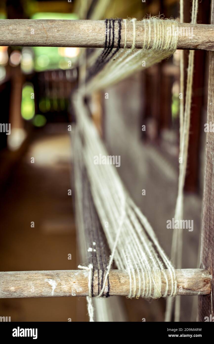 thread on an old weaving war Stock Photo - Alamy