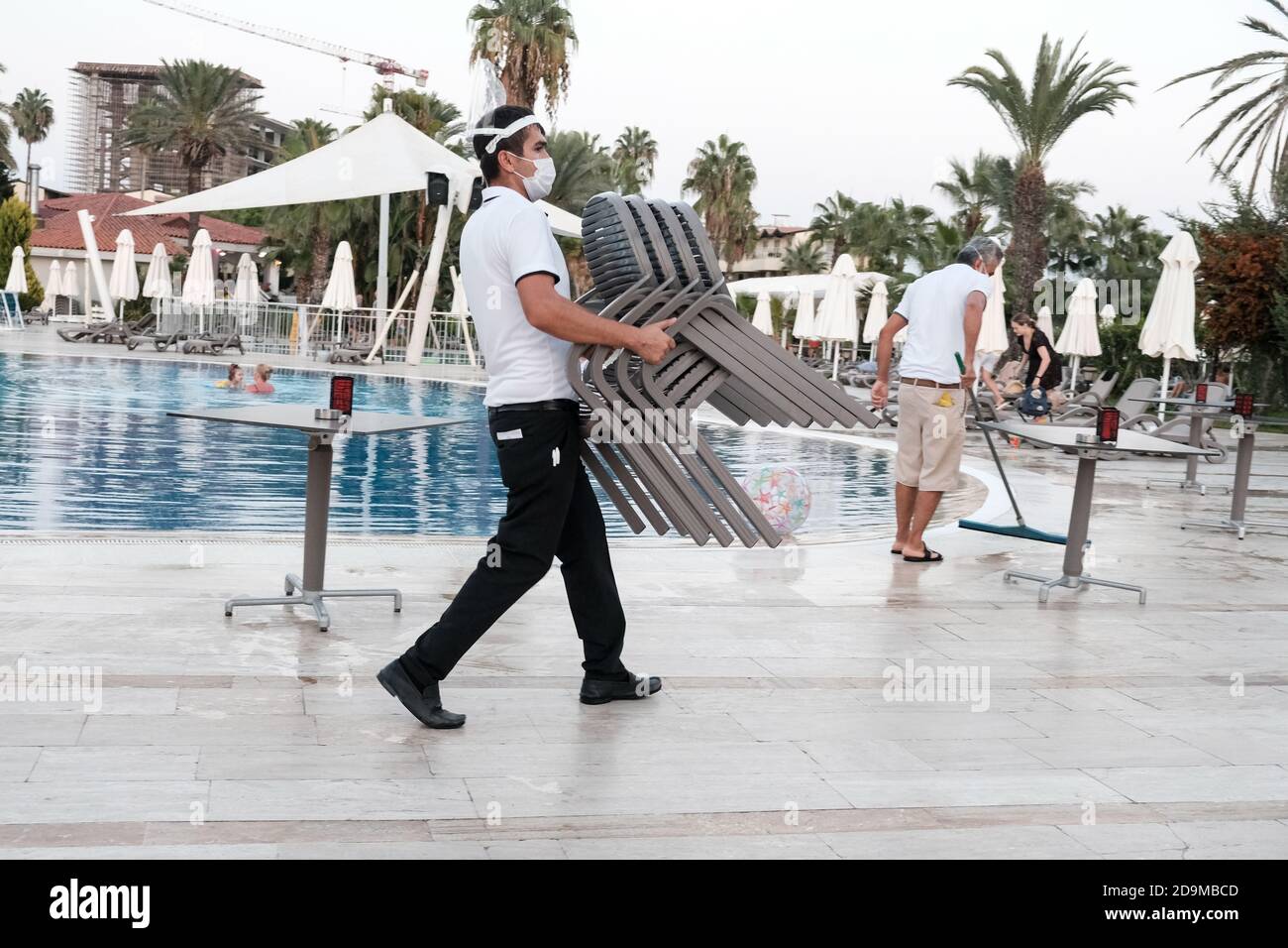 Belek, Turkey - October 2020: Hotel staff wearing face masks in an all ...
