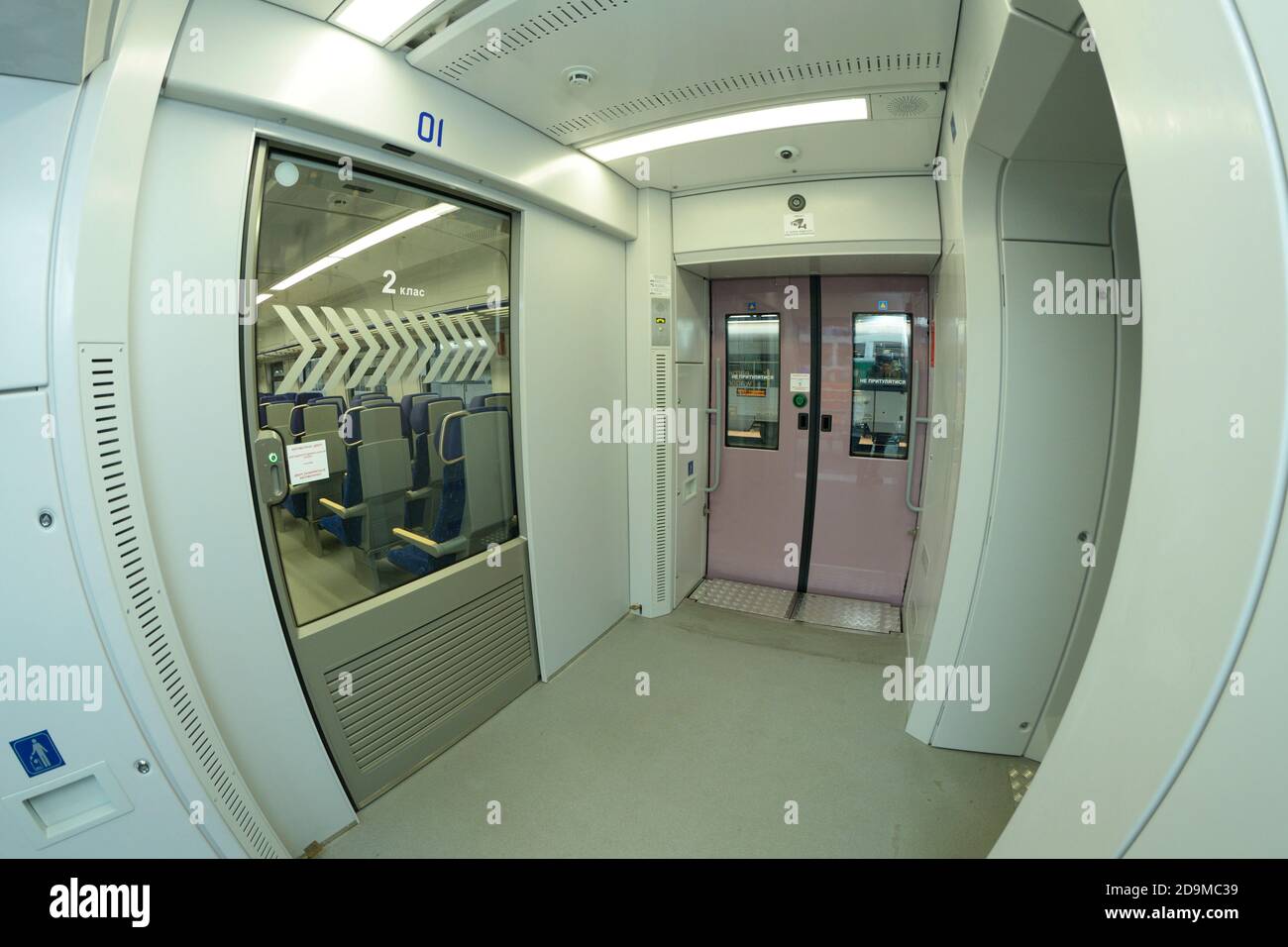 Empty passenger train vestibule, doors to the Second class carriage ...