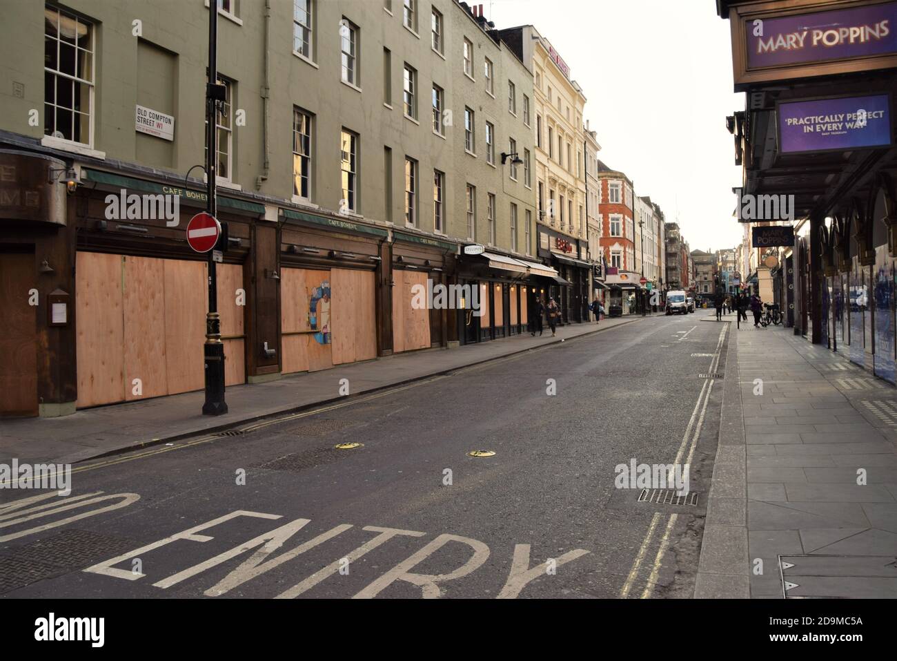 Closed and boarded up restaurants and bars on an empty Old Compton ...