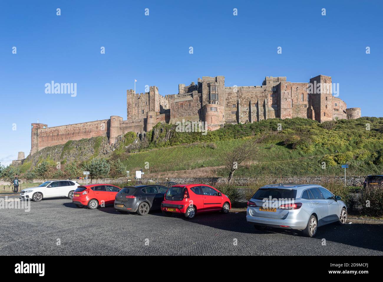 Bamburgh Castle viewed from the landward side car park Stock Photo - Alamy
