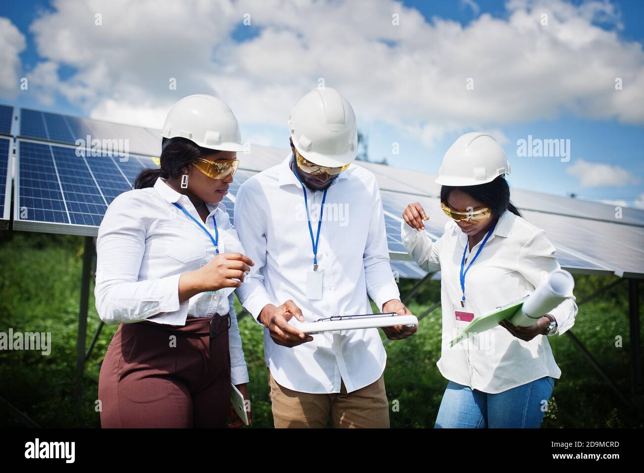 African american technician checks the maintenance of the solar panels ...