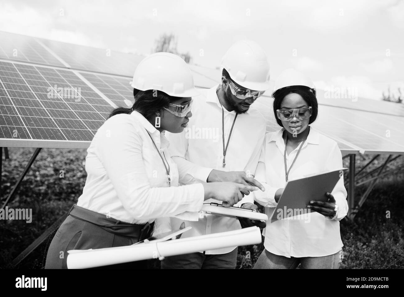 African american technician checks the maintenance of the solar panels ...
